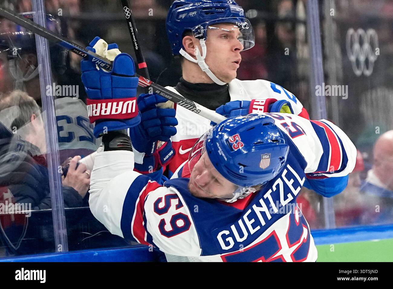 Slovakia's Adam Liska (23) challenges with United States' Jake Guentzel ...