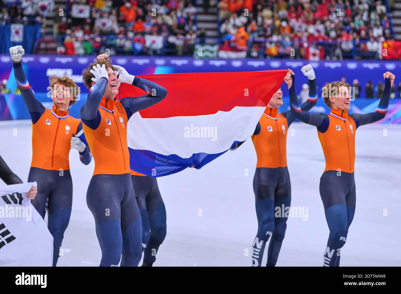Team Netherlands celebrates after a short track speed skating men's ...