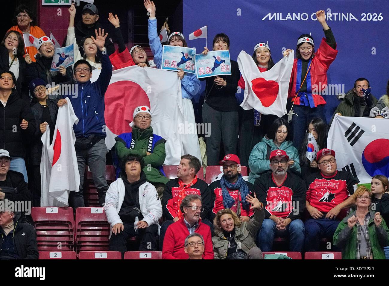Fans cheer before the short track speed skating women's 1500 meters ...