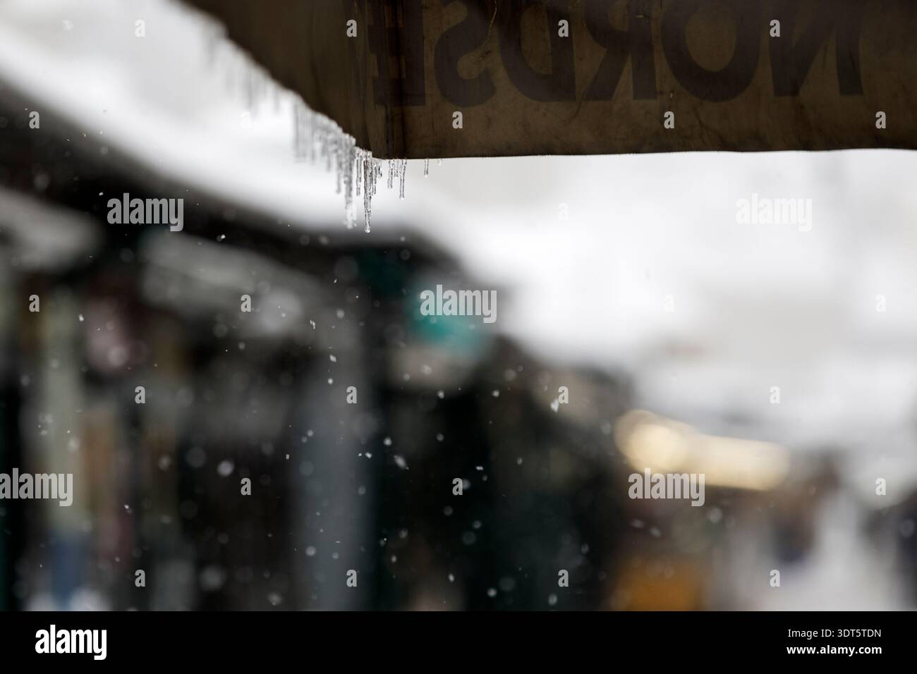 Icicles hang from a canopy at the famous Naschmarkt in Vienna on ...