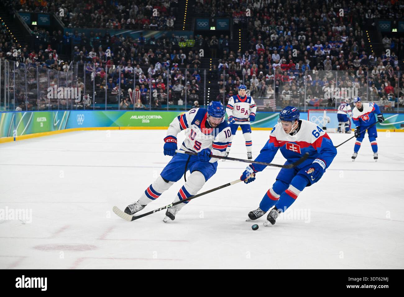 JT Miller (USA),Patrik Koch (SVK) during the Winter Olympic Games ...