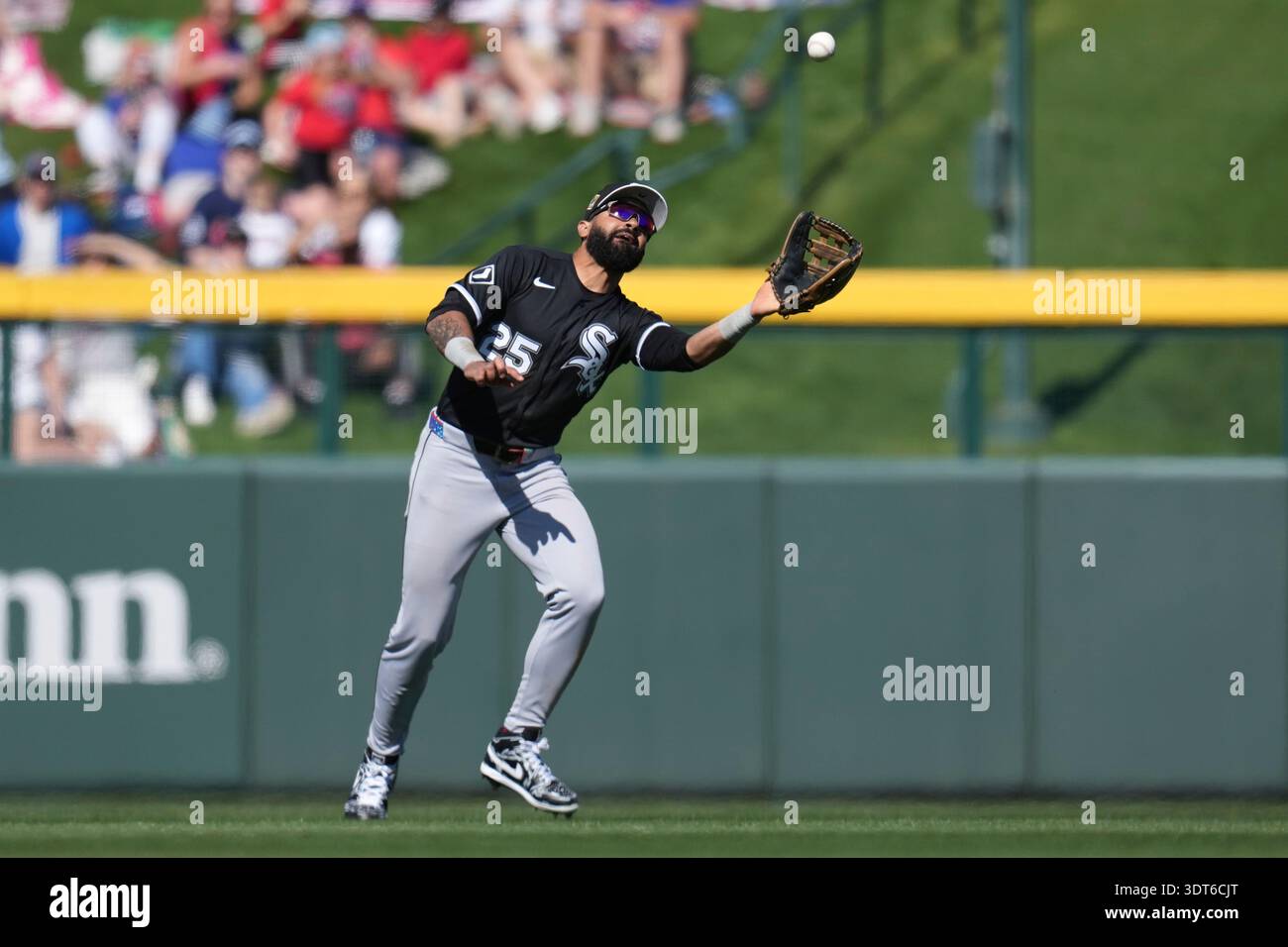 Chicago White Sox center fielder Derek Hill makes a catch on a pop fly ...