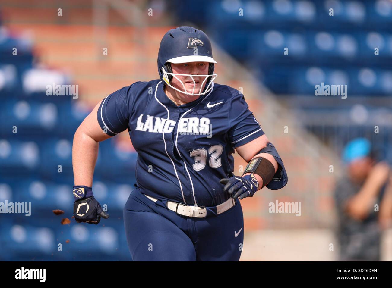 Longwood catcher Maggie Hiatt (32) runs to first during an NCAA ...