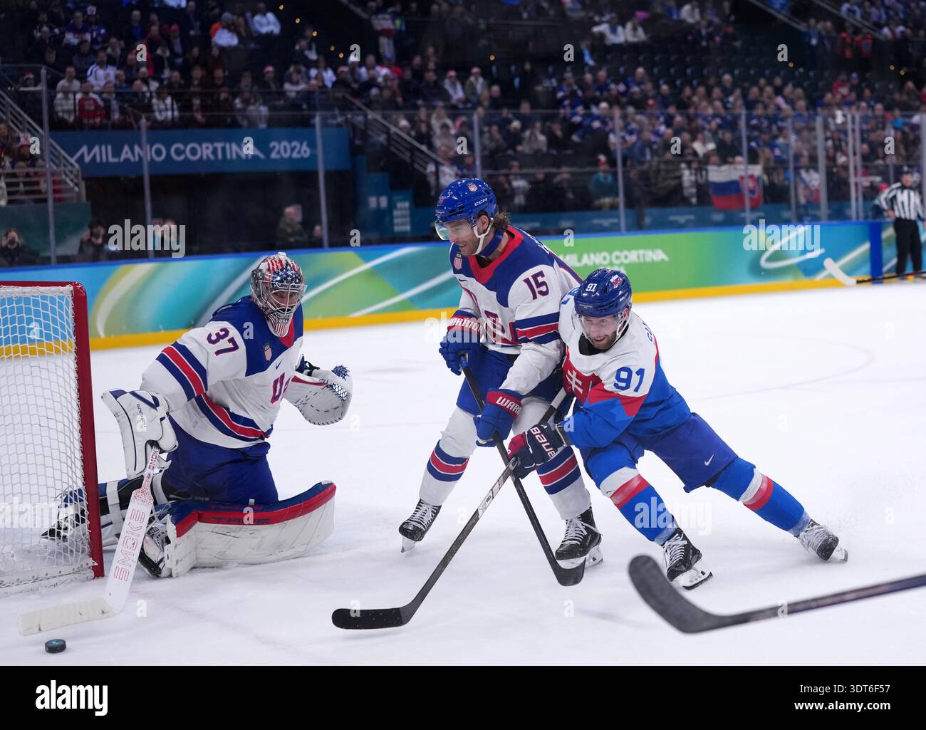(260221) -- MILAN, Feb. 21, 2026 (Xinhua) -- Matus Sukel (R) of ...
