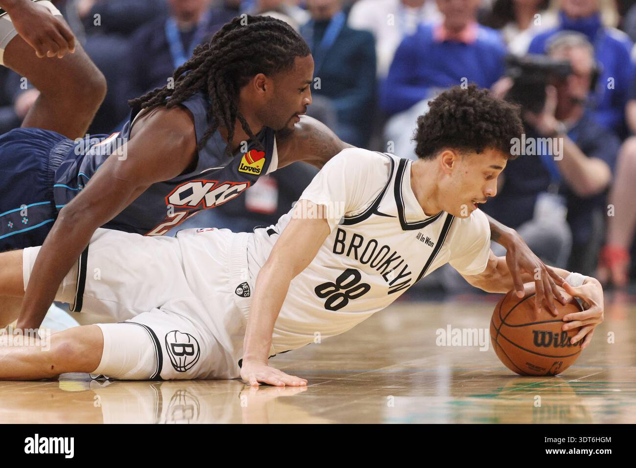 Oklahoma City Thunder guard Cason Wallace, left, and Brooklyn Nets ...