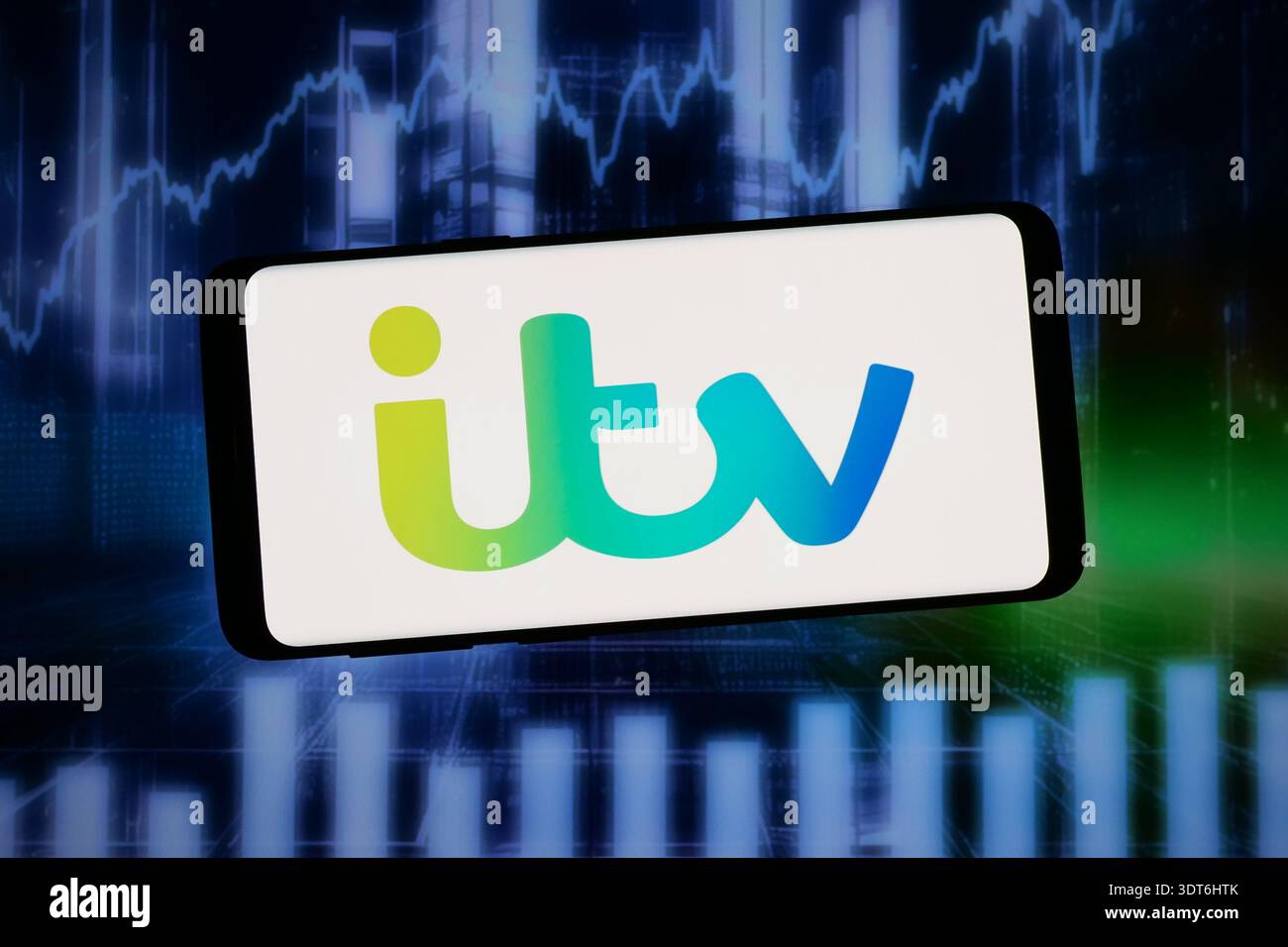 In this photo illustration, the logo of British media company ITV plc ...