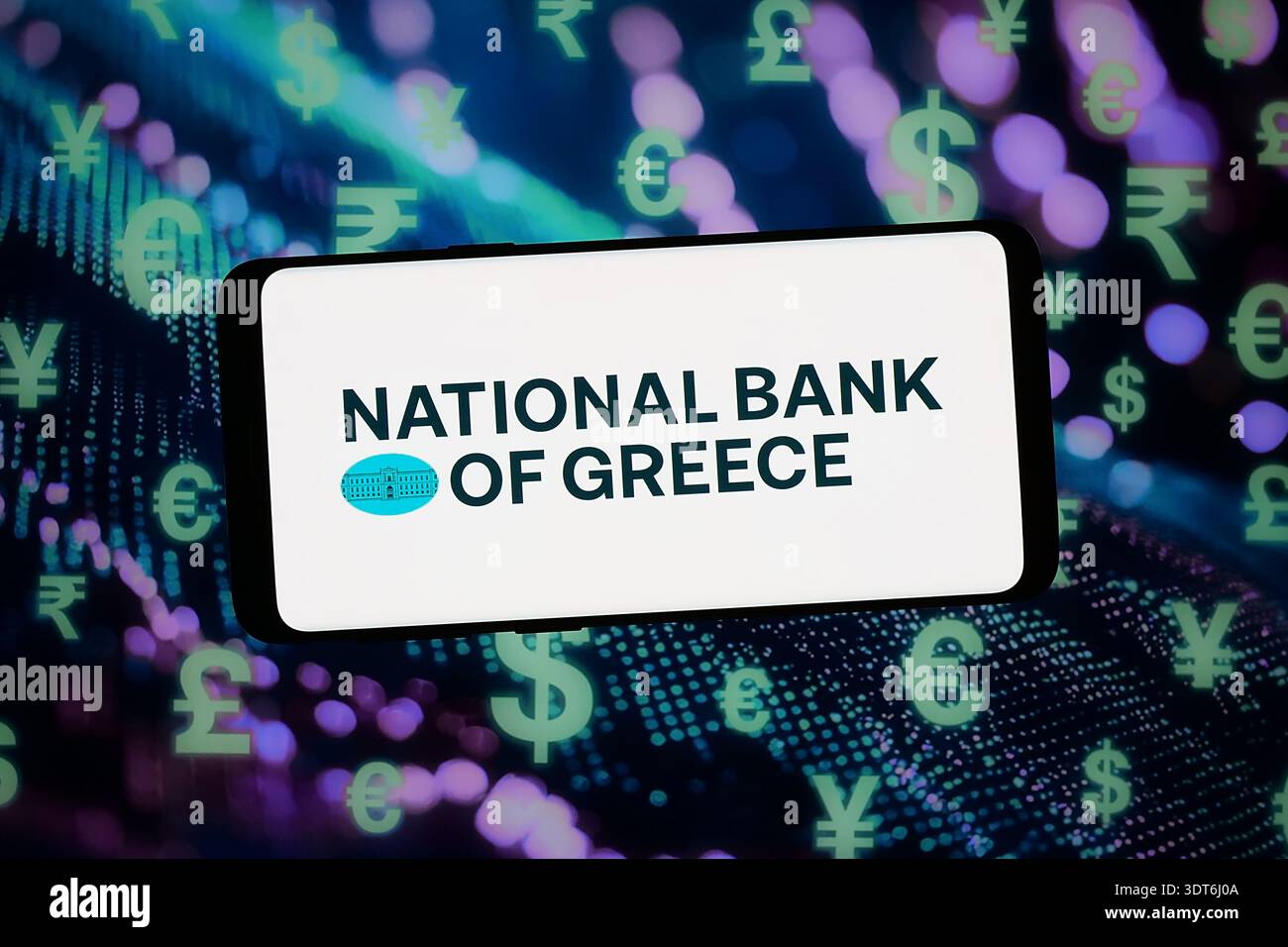 In this photo illustration, the logo of company National Bank of Greece ...