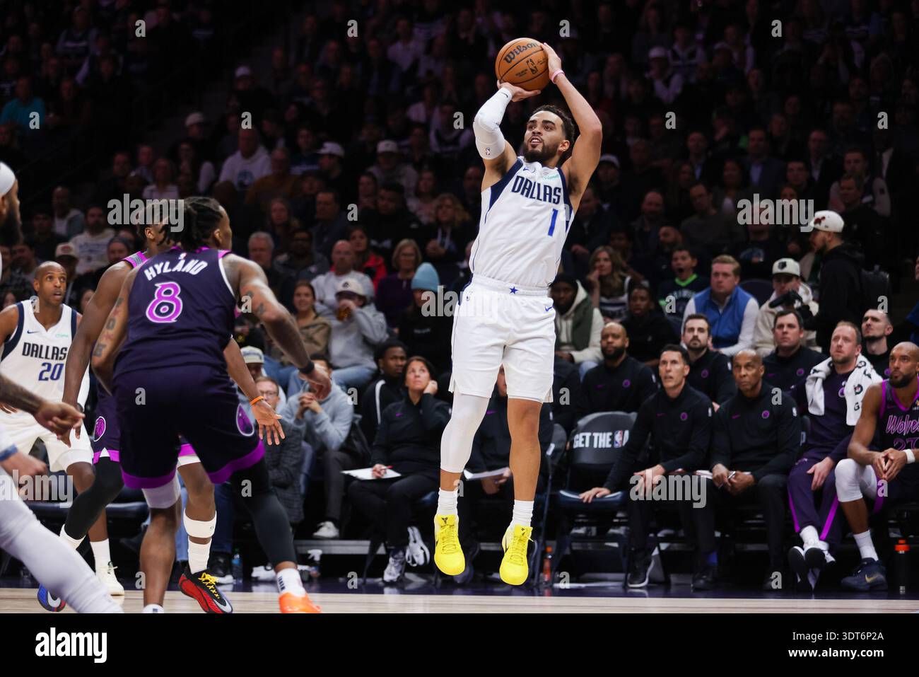 Dallas Mavericks' Tyus Jones (1) goes up to shoot against the Minnesota ...