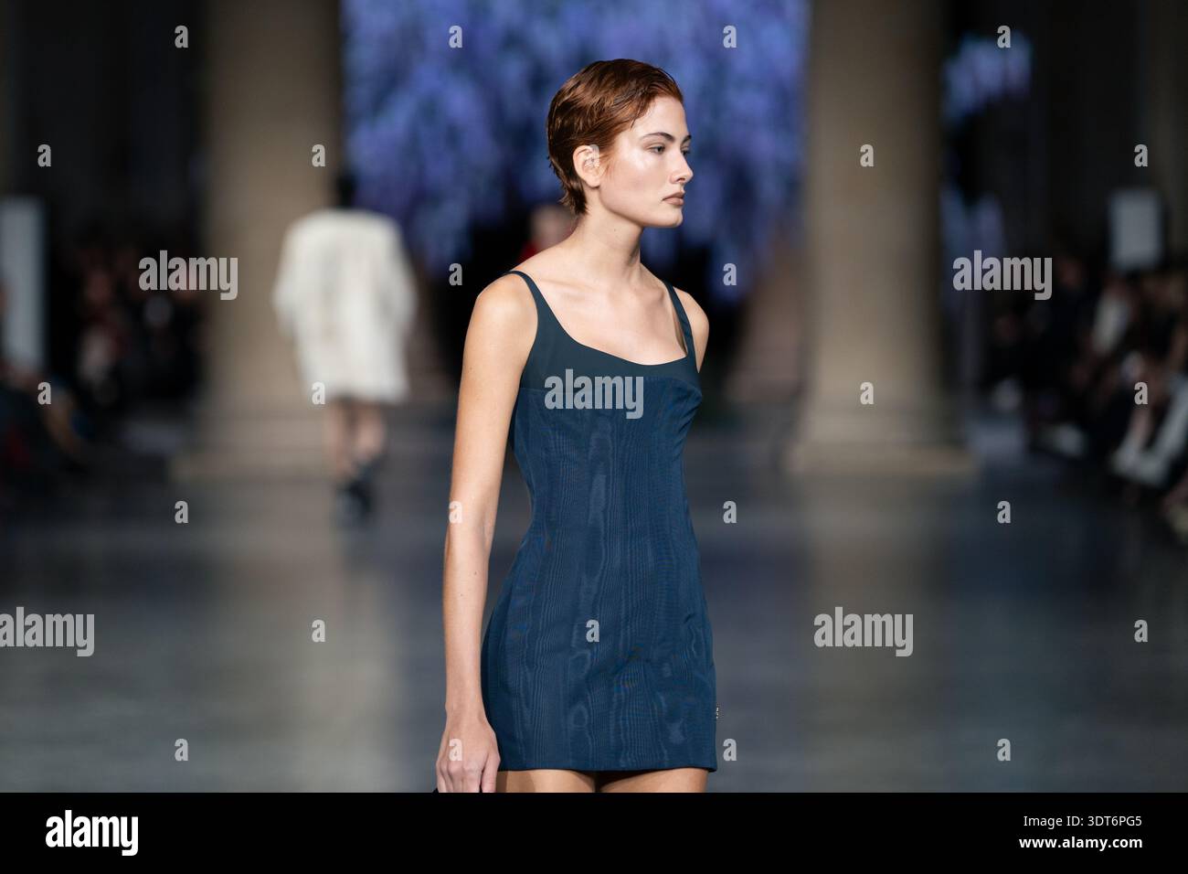 A model walks the runway at the Mithridate show during London Fashion ...