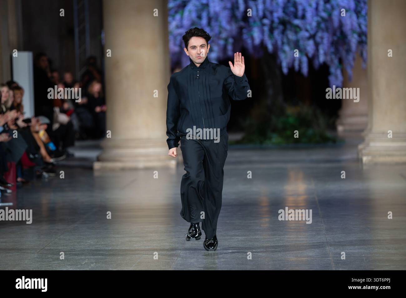 A model walks the runway at the Mithridate show during London Fashion ...