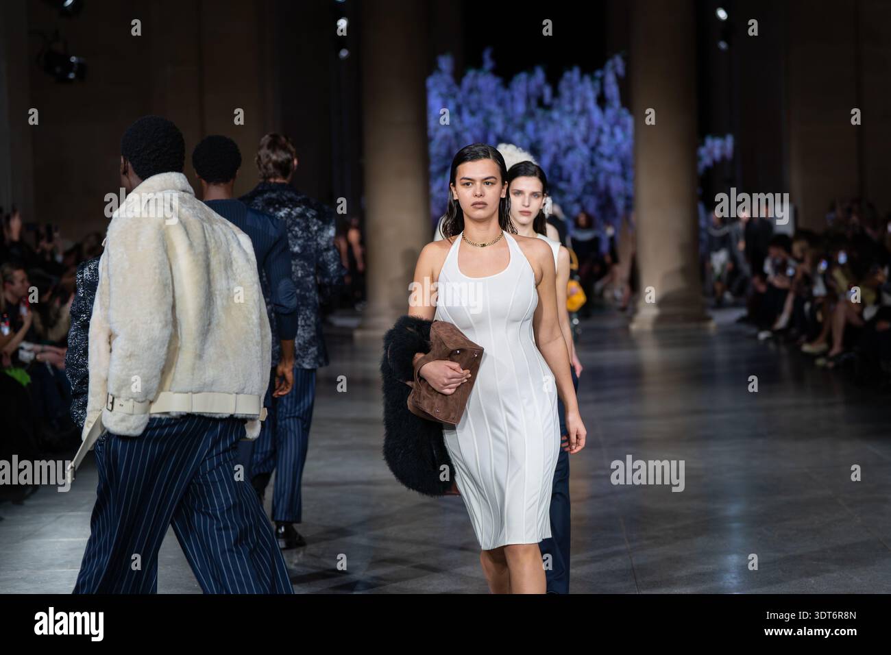 A model walks the runway at the Mithridate show during London Fashion ...