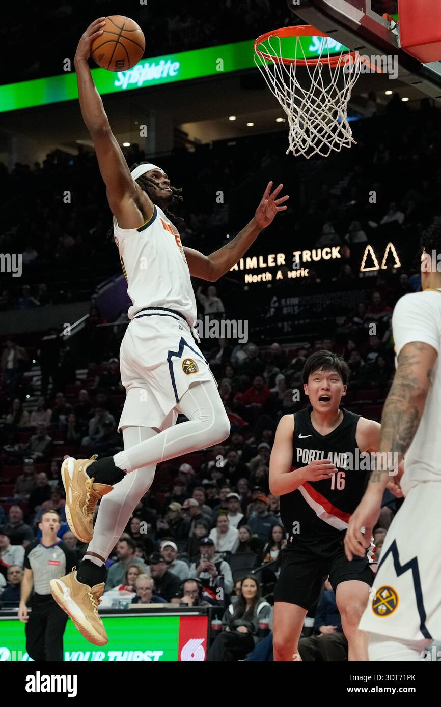 Denver Nuggets forward Daron Holmes II shoots as Portland Trail Blazers ...