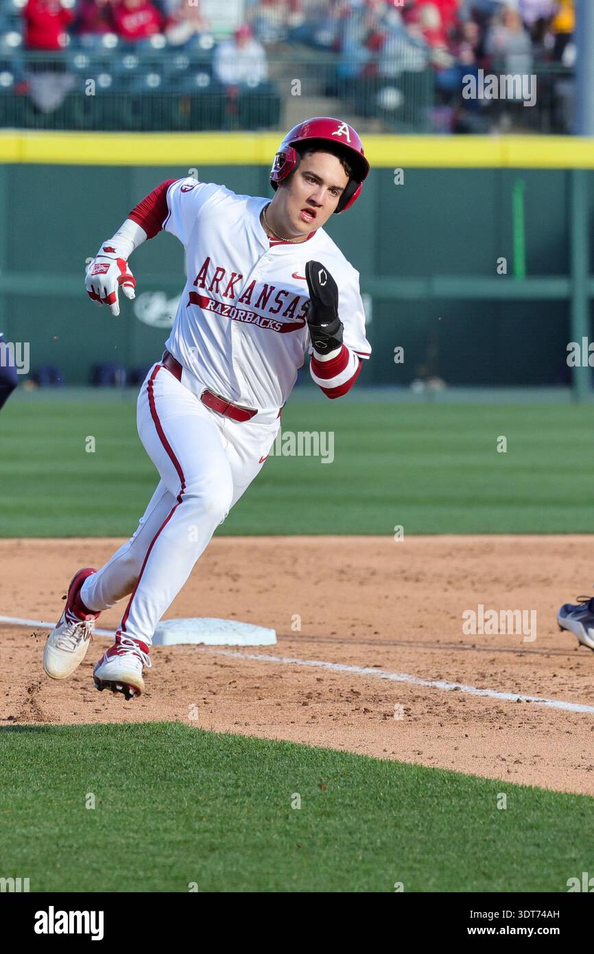 February 20, 2026: Arkansas base runner Carson Brumbaugh (1) rounds ...
