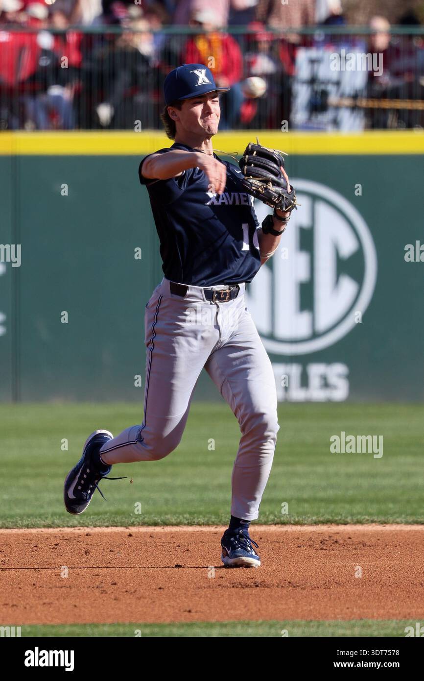 February 20, 2026: Musketeers infielder Eddie Peters (16) flips the ...