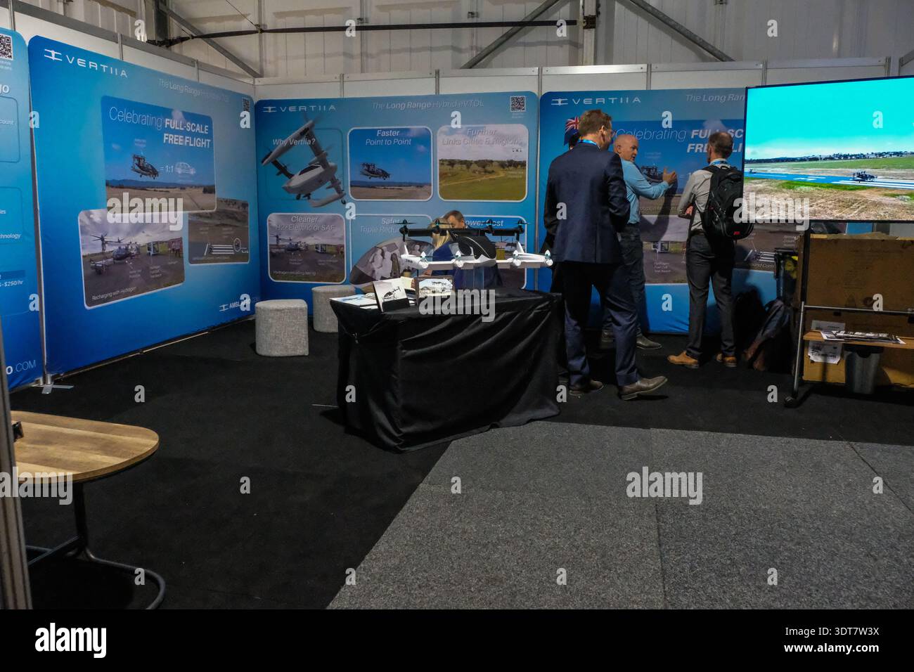 Vertiia booth demonstrating a vertical take off and landing small ...