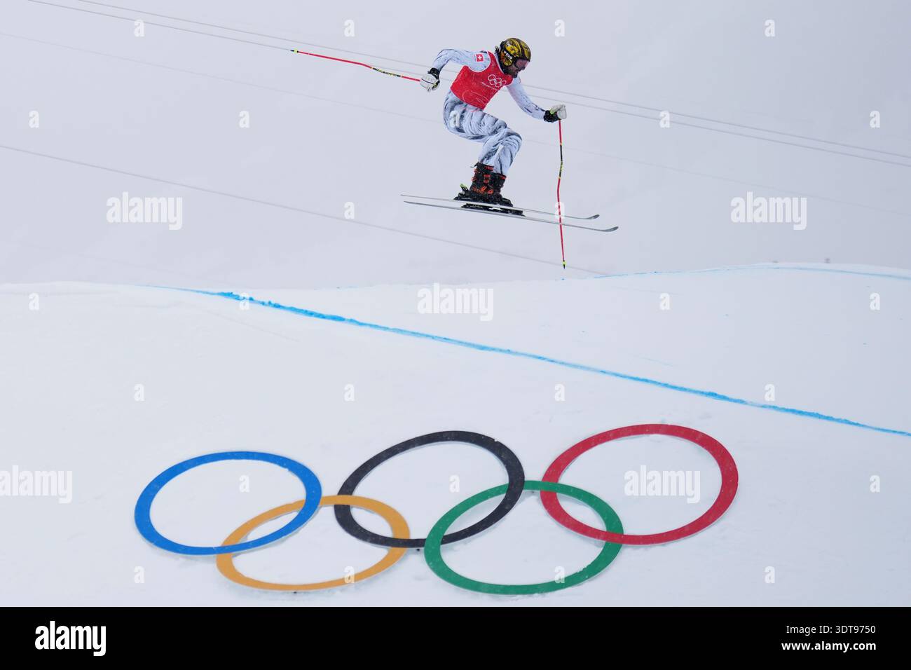 Switzerland's Ryan Regez (3) competes during the men's ski cross finals ...