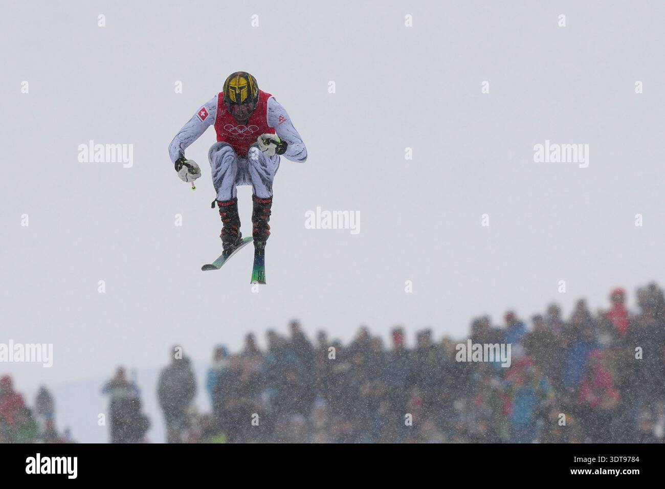 Switzerland's Ryan Regez (3) competes during the men's ski cross finals ...