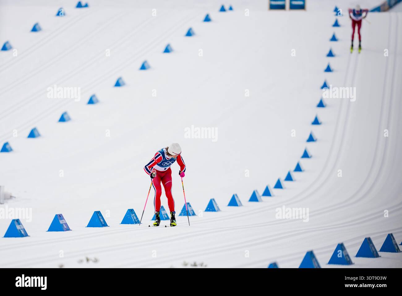 Johannes Hoesflot Klaebo, of Norway, looks back at Martin Loewstroem ...