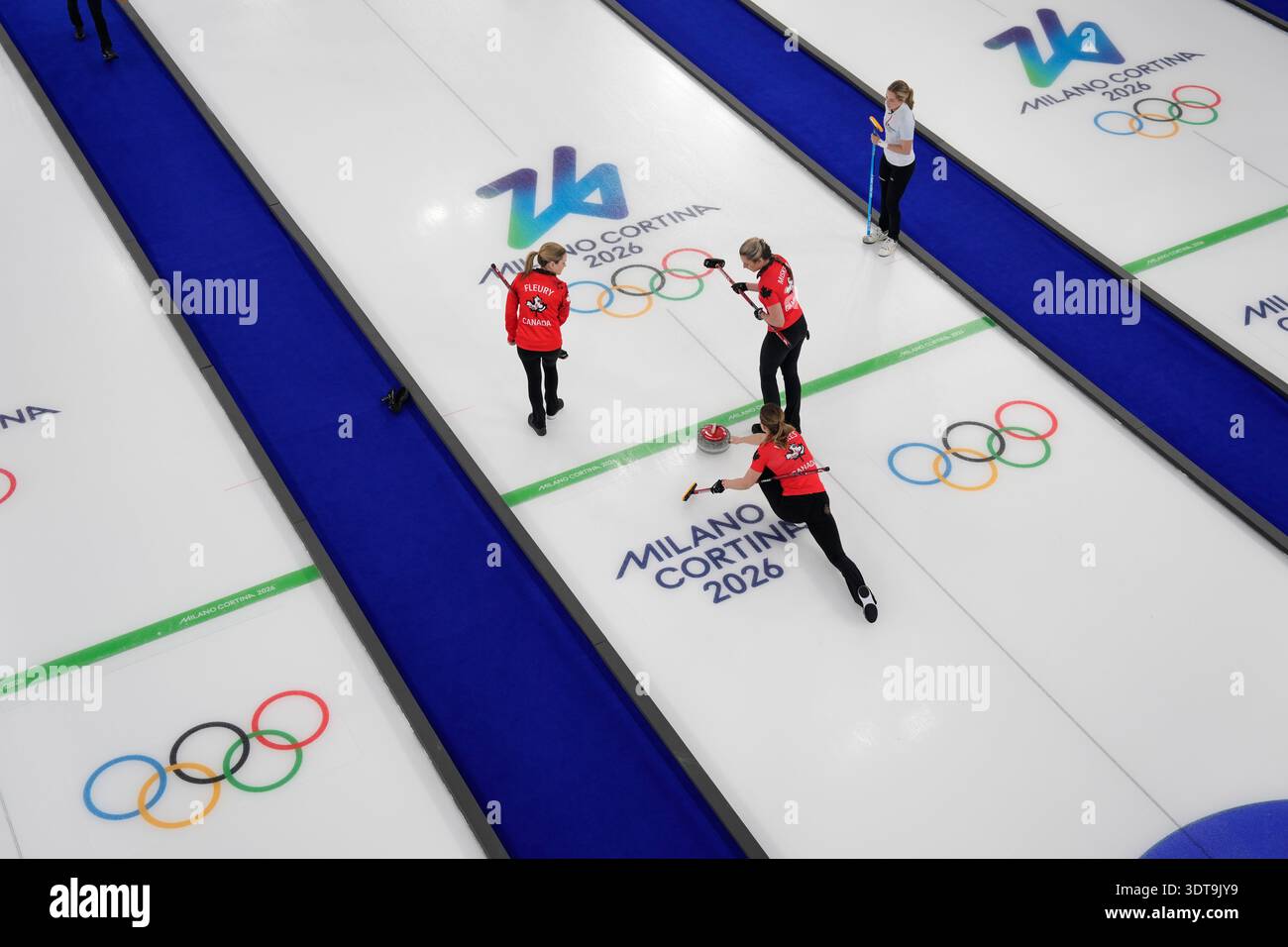 Canada's Sarah Wilkes, Emma Miskew and Tracy Fleury compete during a ...