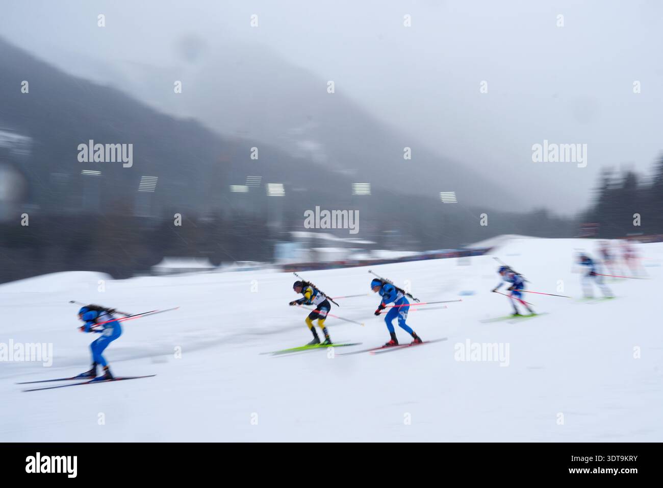 Dorothea Wierer, of Italy, center, competes in the women's 12.5 ...
