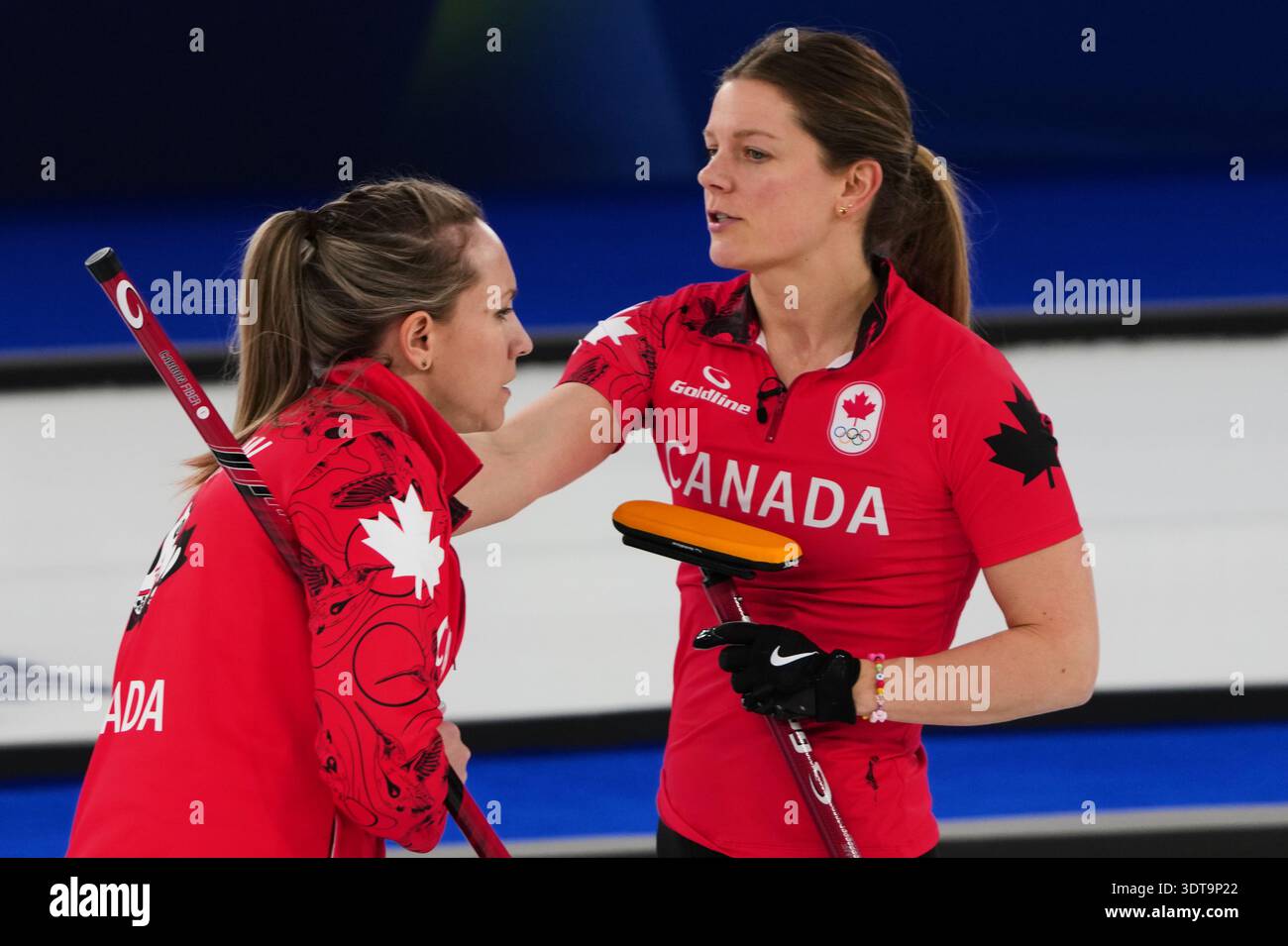 Canada's Sarah Wilkes, right, and Rachel Homan compete during a women's ...