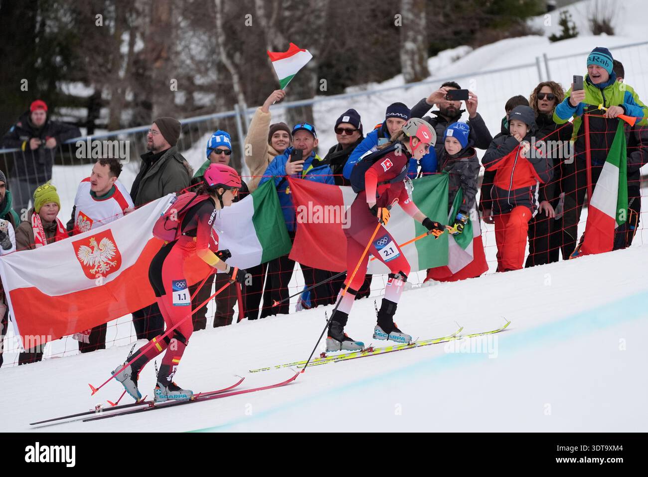 Spain's Ana Alonso Rodriguez, left, follows Switzerland's Marianne ...