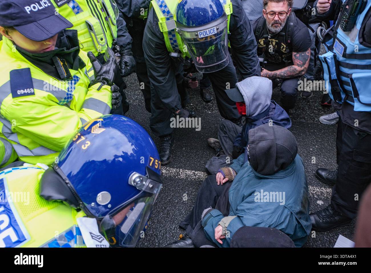 Manchester, UK. 21st Feb 2026. Protesters supporting Britain First ...