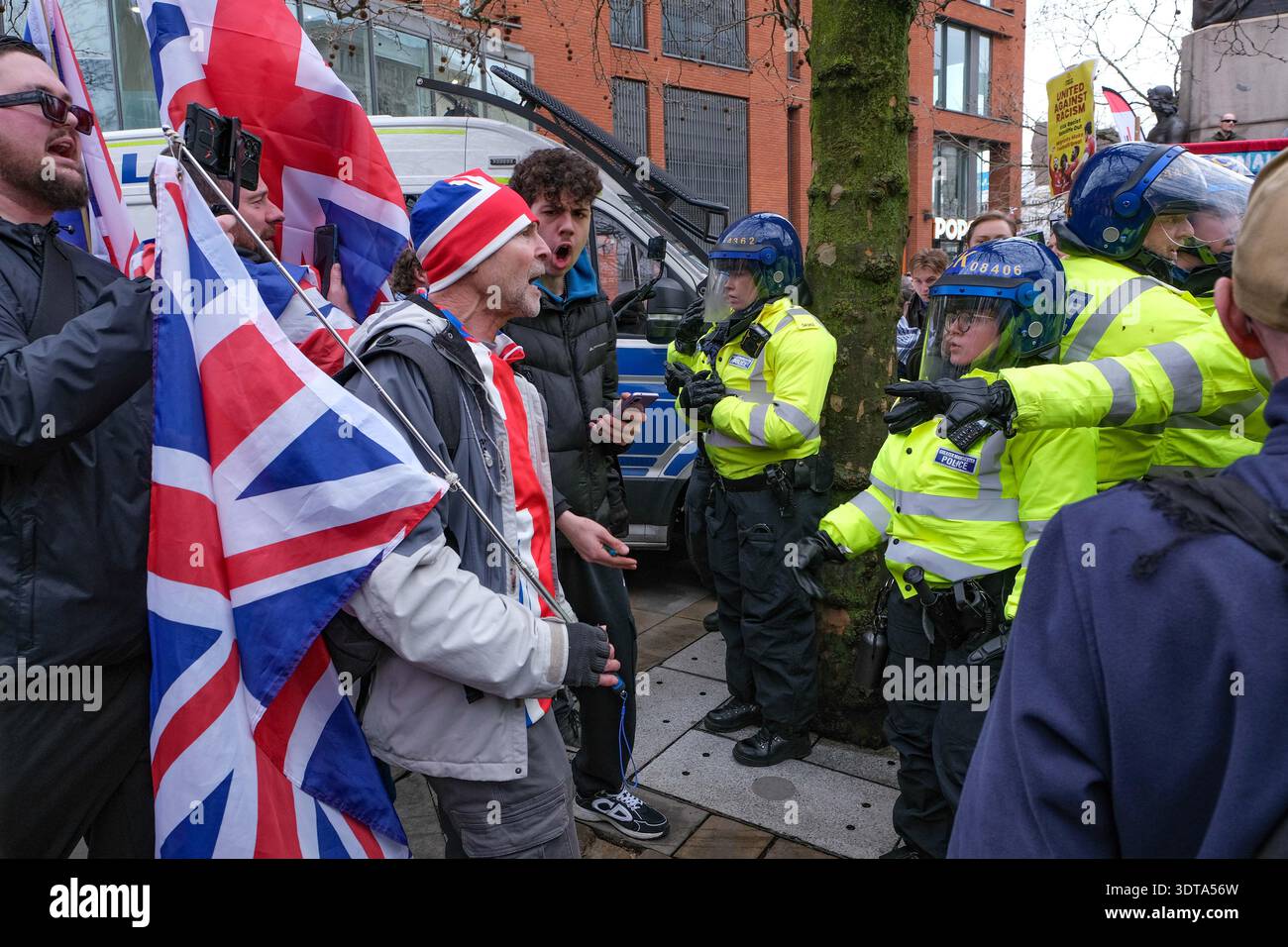 Manchester, UK. 21st Feb 2026. Protesters supporting Britain First ...