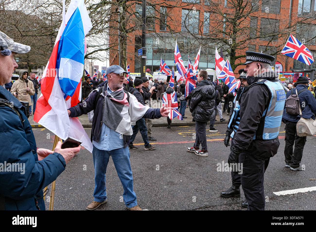 Manchester, UK. 21st Feb 2026. Protesters supporting Britain First ...