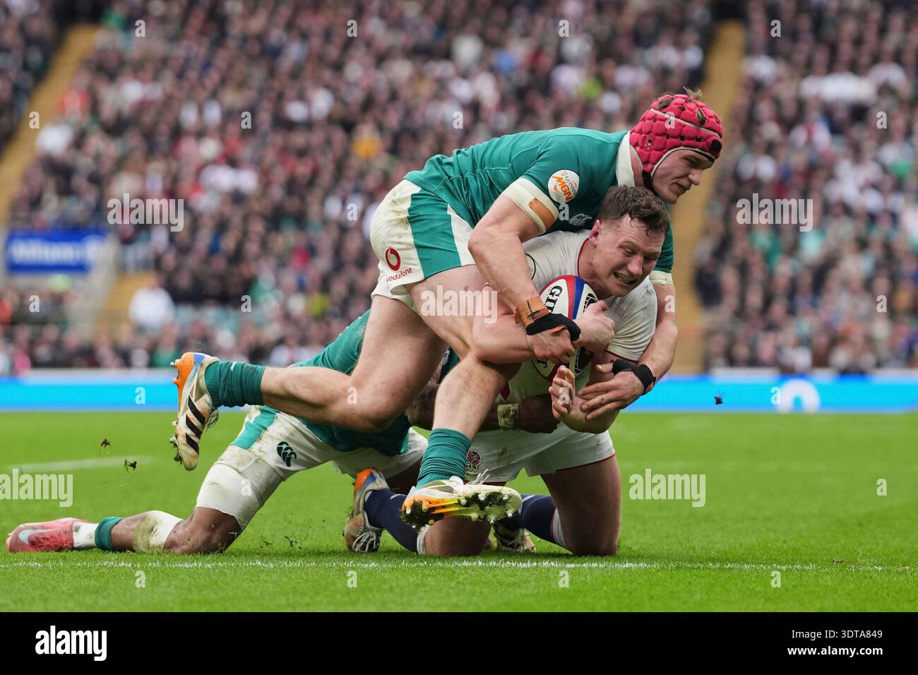 England's Fraser Dingwall, right, scores a try as Ireland's Joe ...