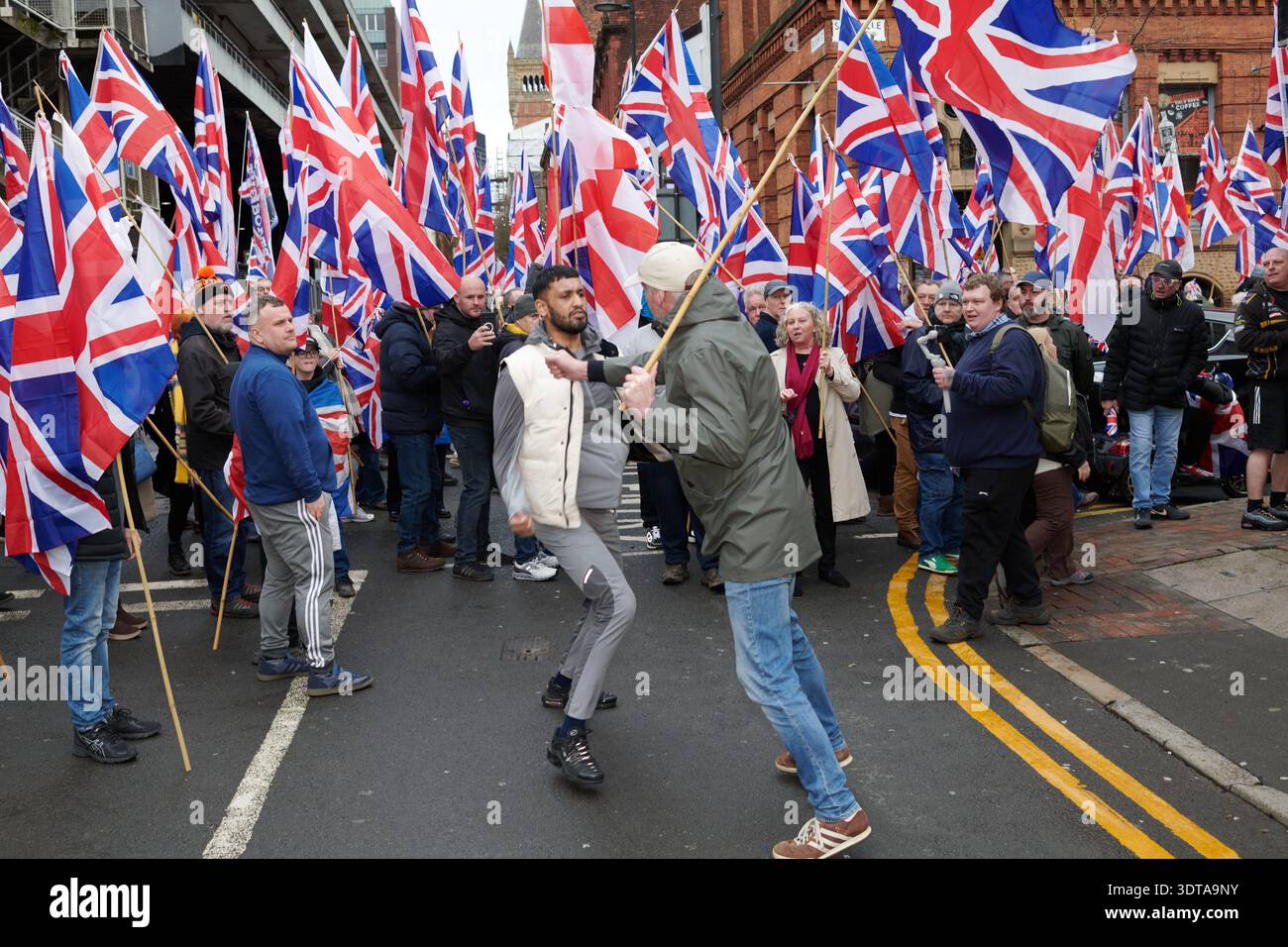 Manchester, UK. 21st February 2026. Far right group Britain First clash ...