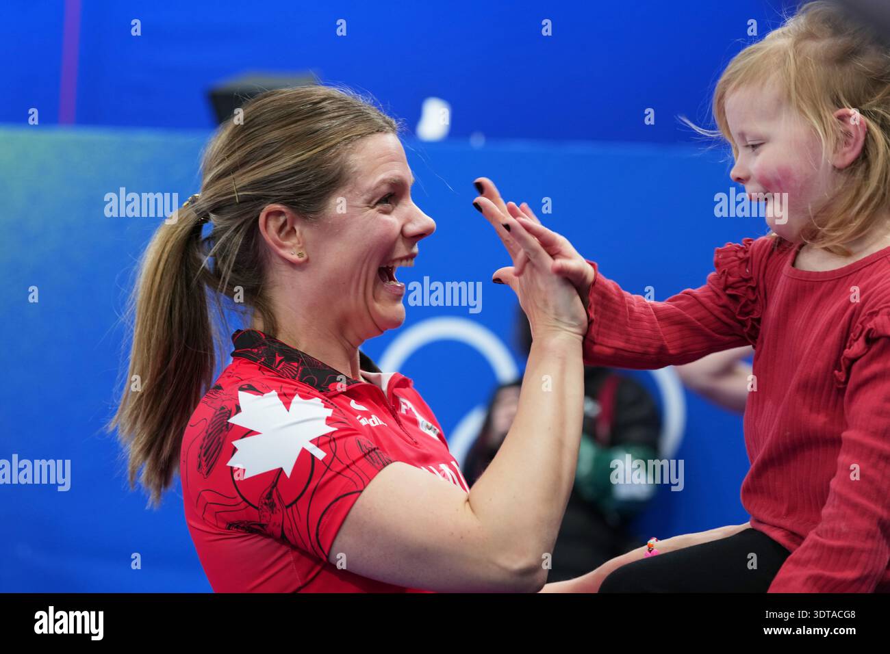 Canada's Sarah Wilkes celebrates winning a women's curling bronze medal ...