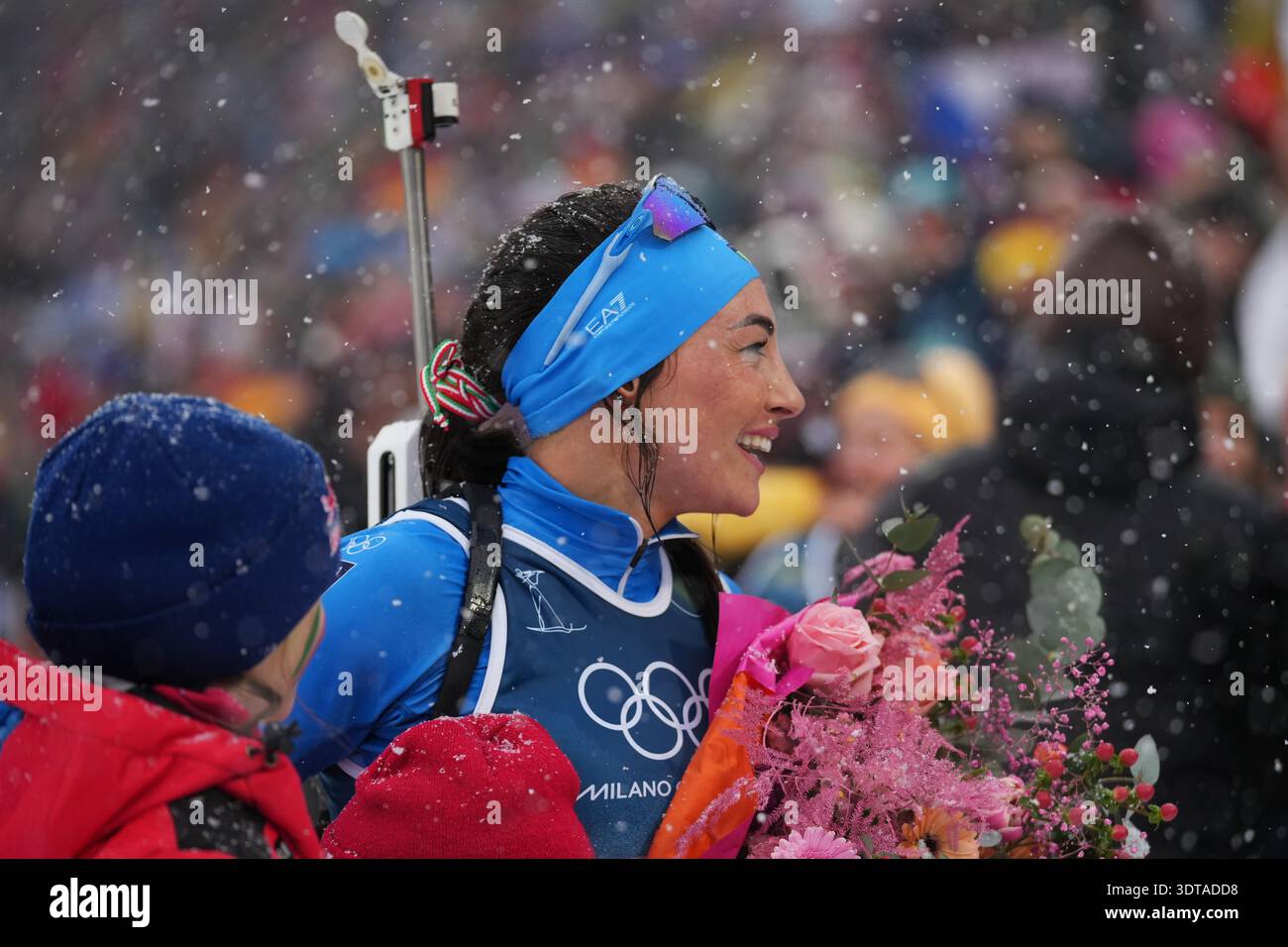 Dorothea Wierer, of Italy, celebrates her retirement after the women's ...