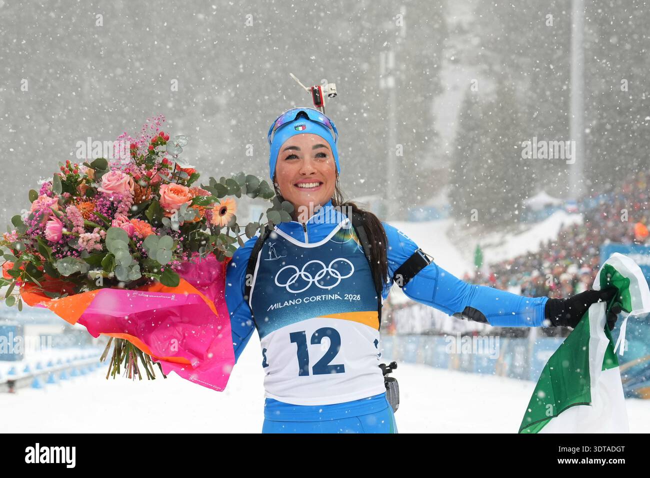 Dorothea Wierer, of Italy, poses for photos as she celebrates her ...