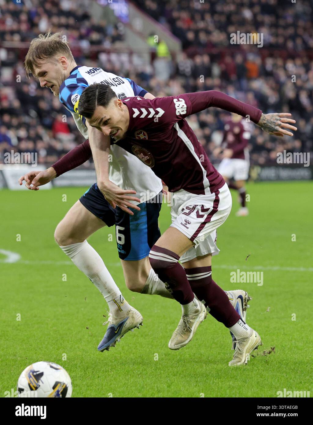 Heart of Midlothian's Alexandros Kyziridis and Falkirk's Coll Donaldson ...