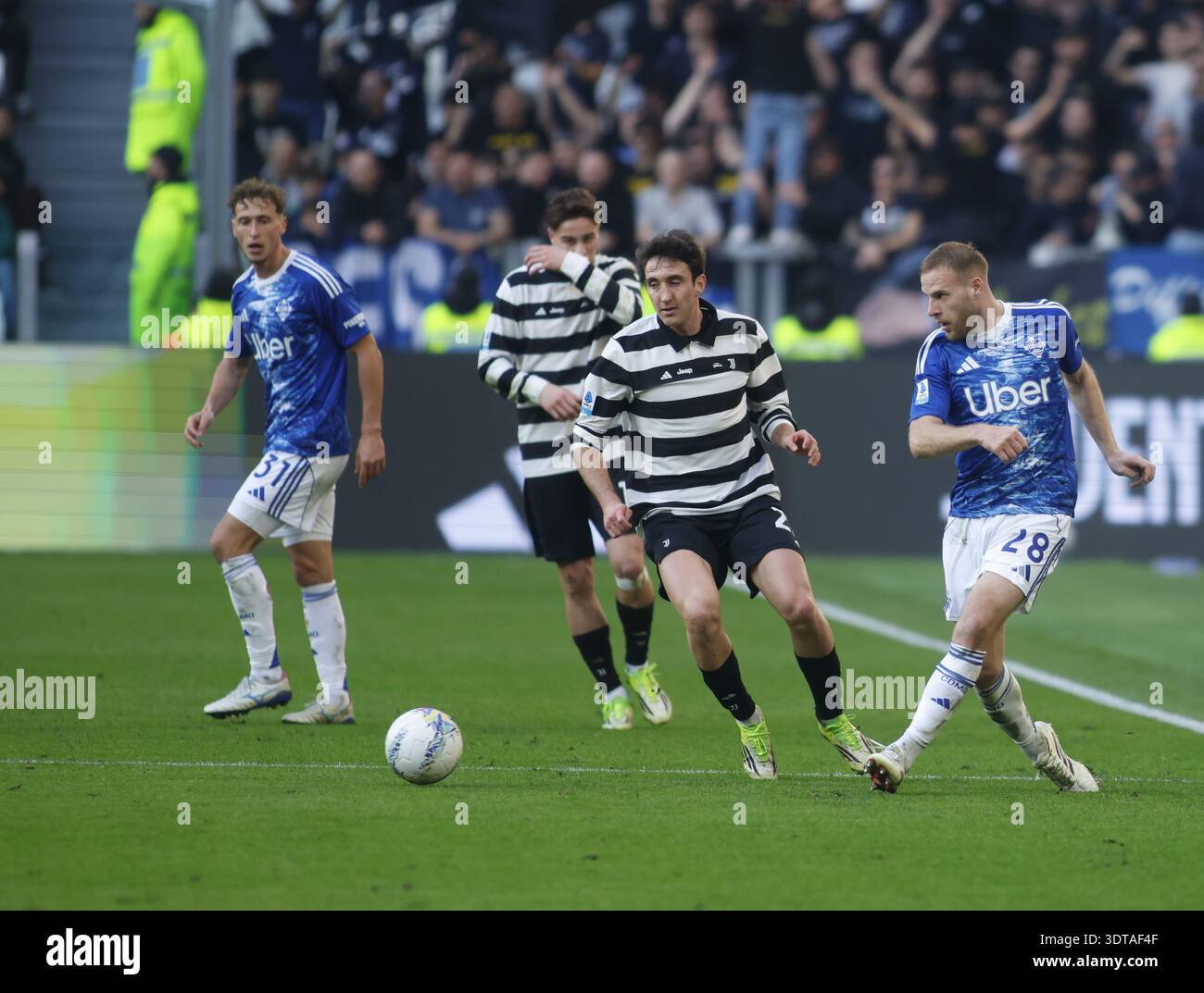 Ivan Smolcic of Como 1907 and Andrea Cambiaso of Juventus FC during the ...