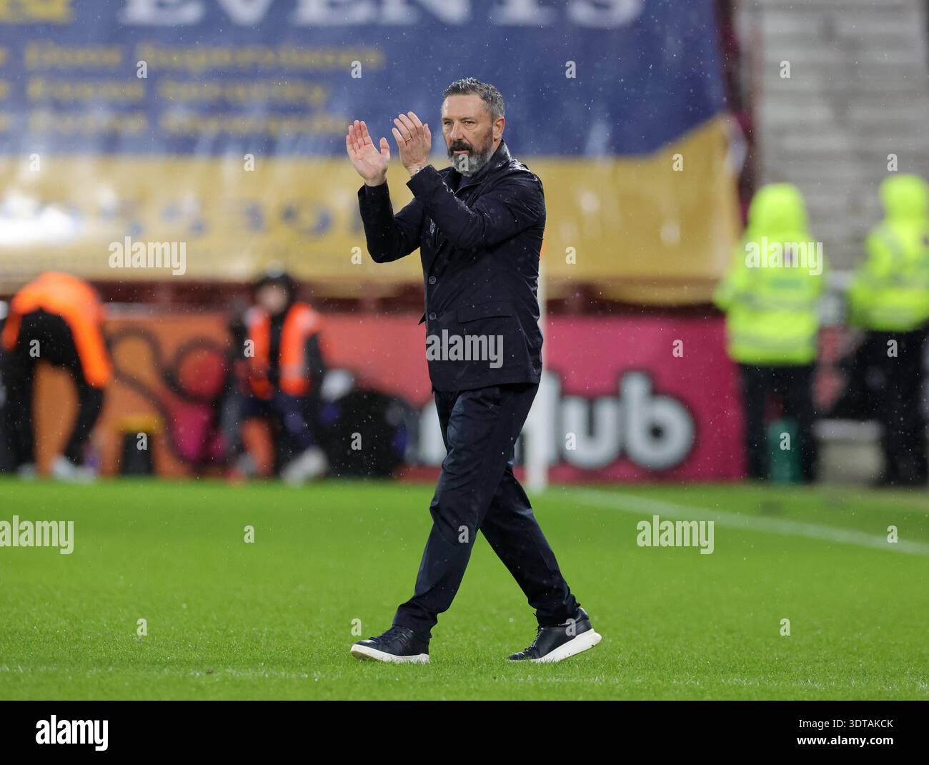 Heart of Midlothian manager Derek McInnes applauds the fans at full ...