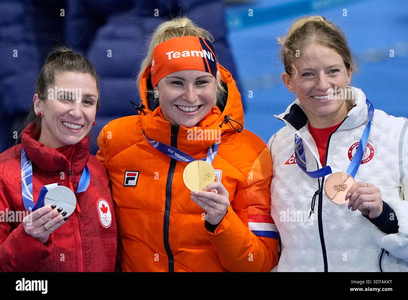 Marijke Groenewoud of the Netherlands, center and gold medal, Ivanie ...