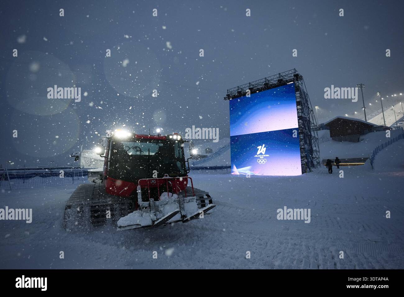 Snowcat driver Oliviero Galli cleans up courses after a weather delay ...