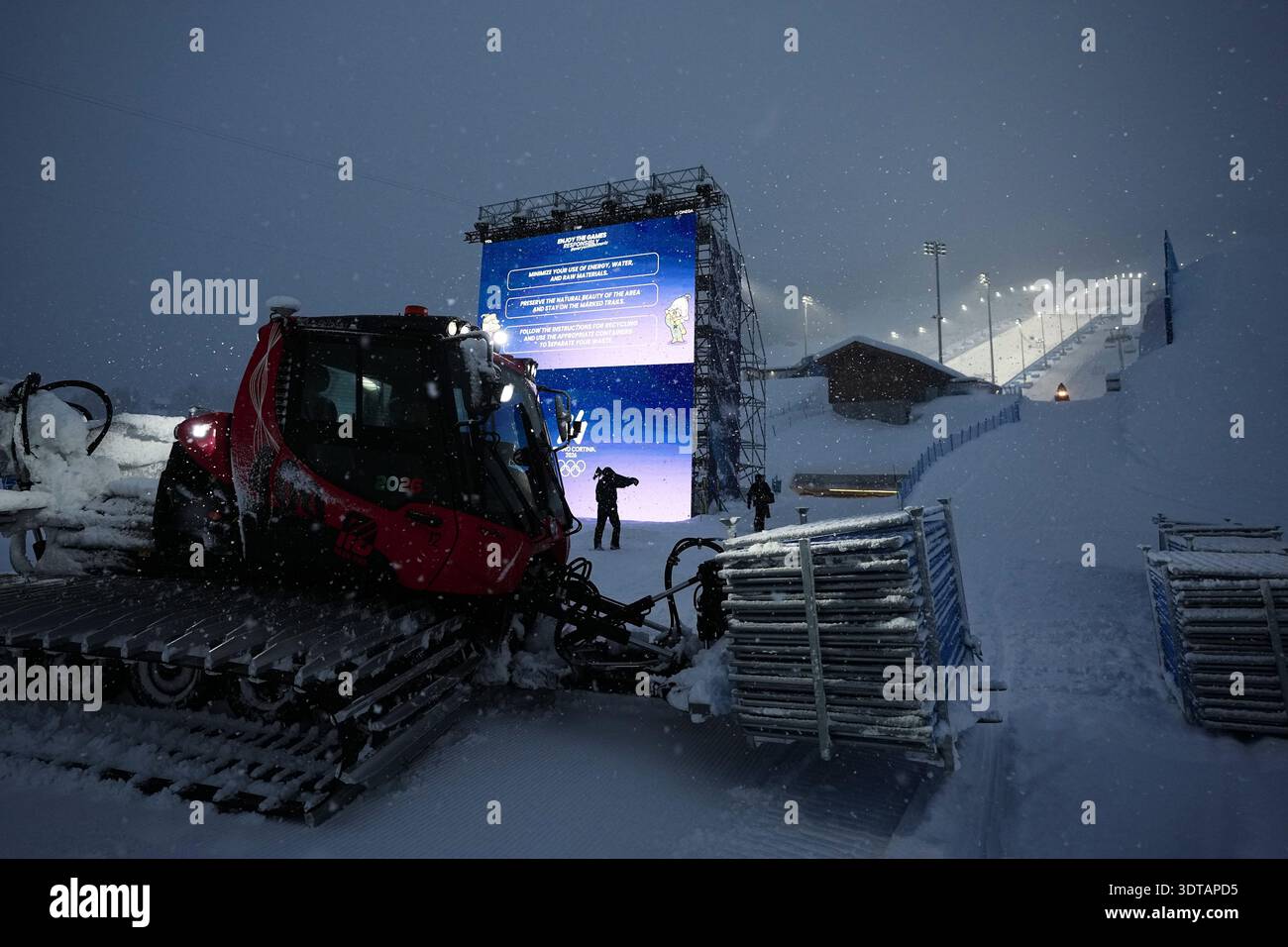 Snowcat driver Oliviero Galli puts away fencing for the day after a ...