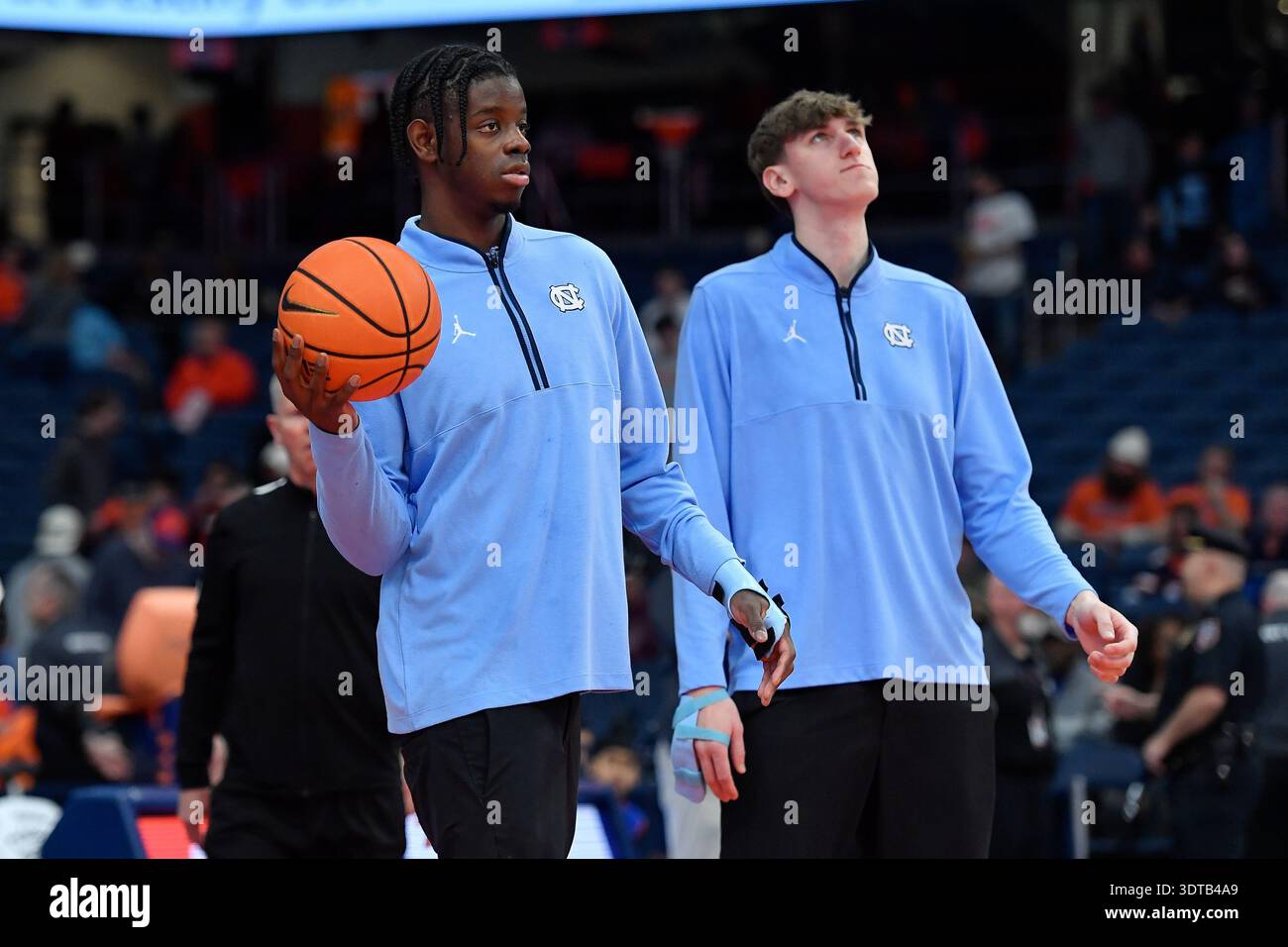 North Carolina forward Caleb Wilson, left, watches warm ups before an ...