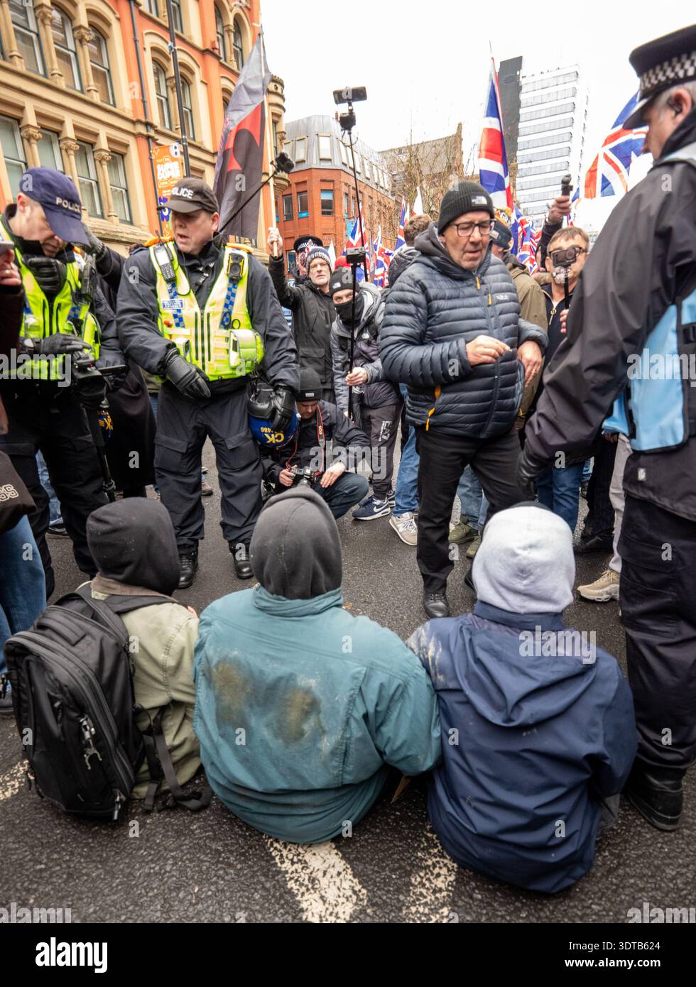 Anti Britain First protesters block march by sitting in road. Britain ...