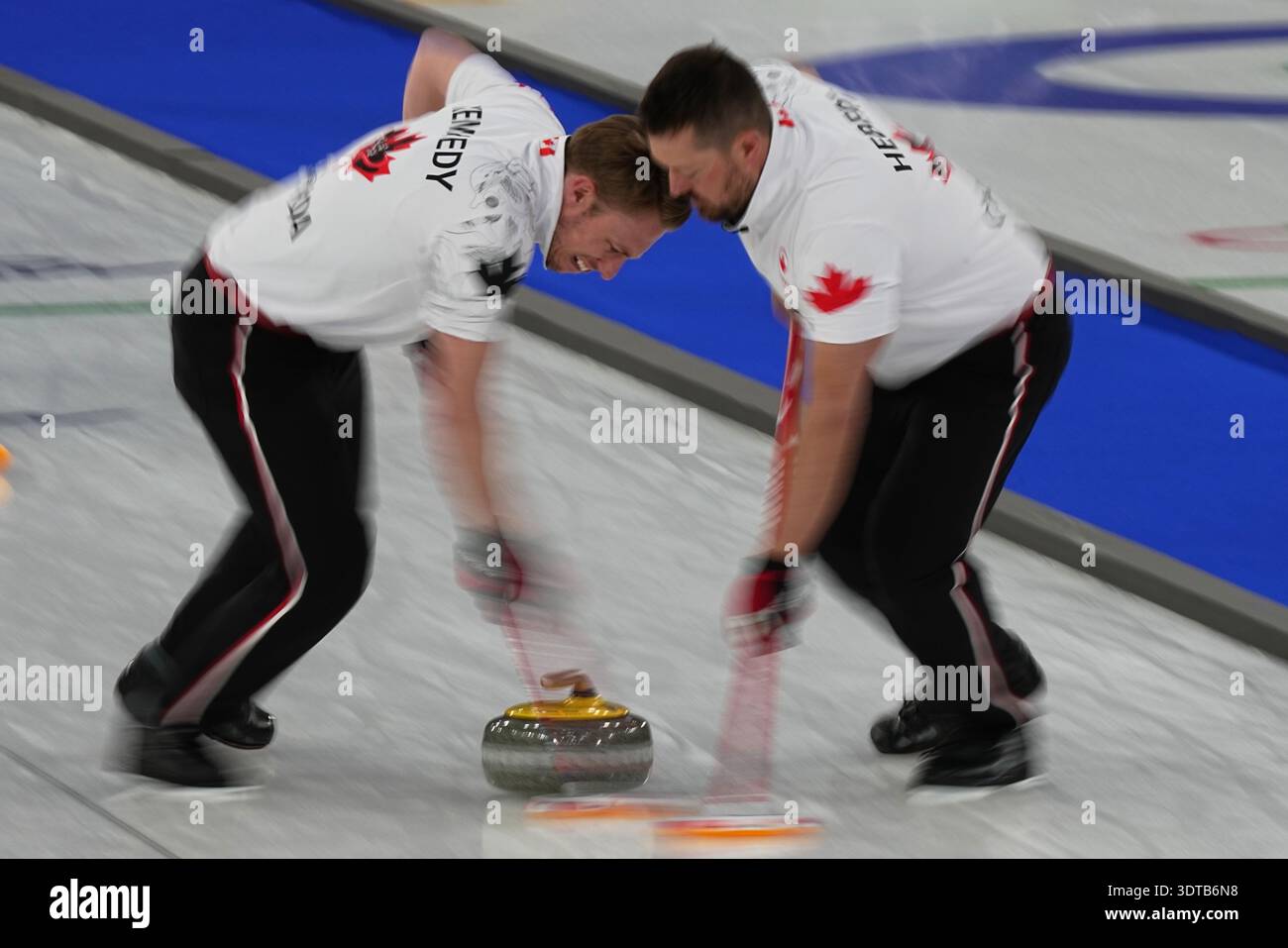 Canada's Marc Kennedy, left, and Ben Hebert compete during a men's ...