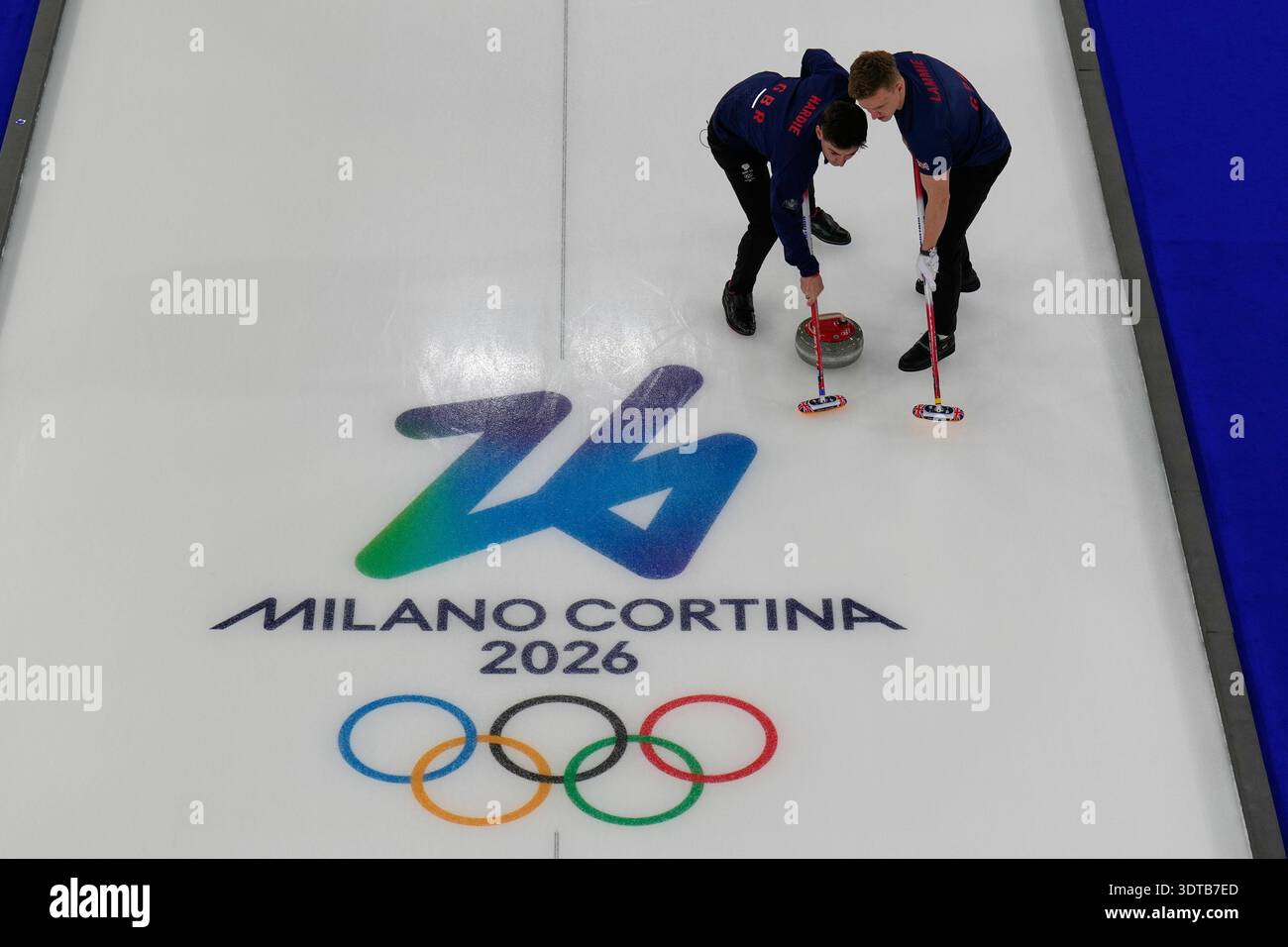 Britain's Grant Hardie and Bobby Lammie sweep ahead of a stone during ...
