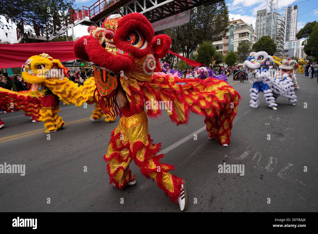 Dancers perform a lion dance during the Lunar New Year celebrations in ...