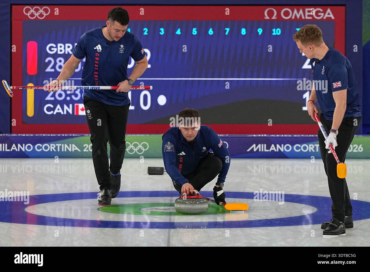 Britain's Bruce Mouat, centre, competes during a men's curling gold ...
