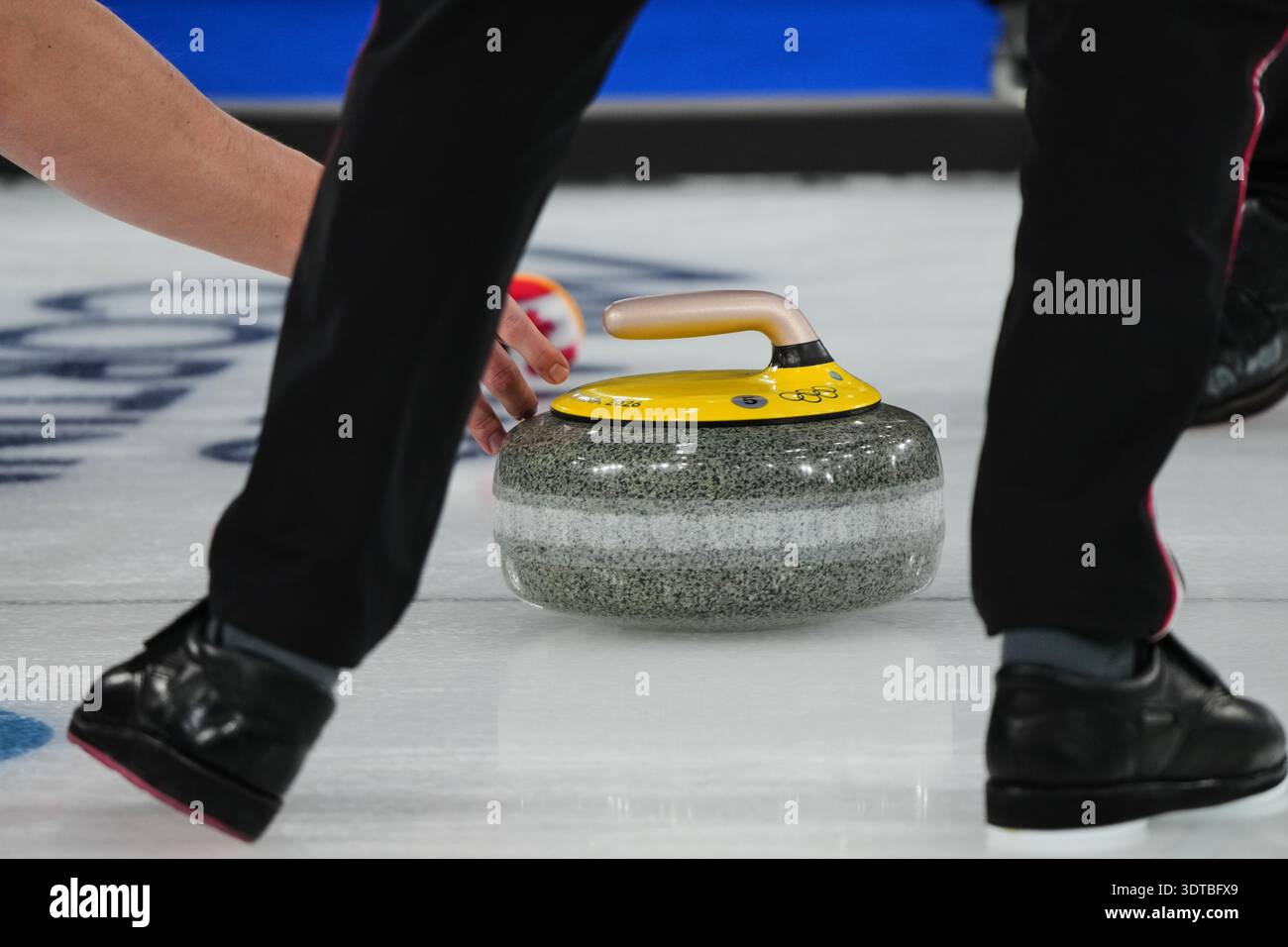 Canada's Brett Gallant touches the stone during a men's curling gold ...
