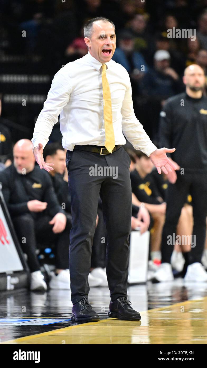 IOWA CITY, IA - FEBRUARY 17:Iowa head coach Ben McCollum as seen Iowa ...