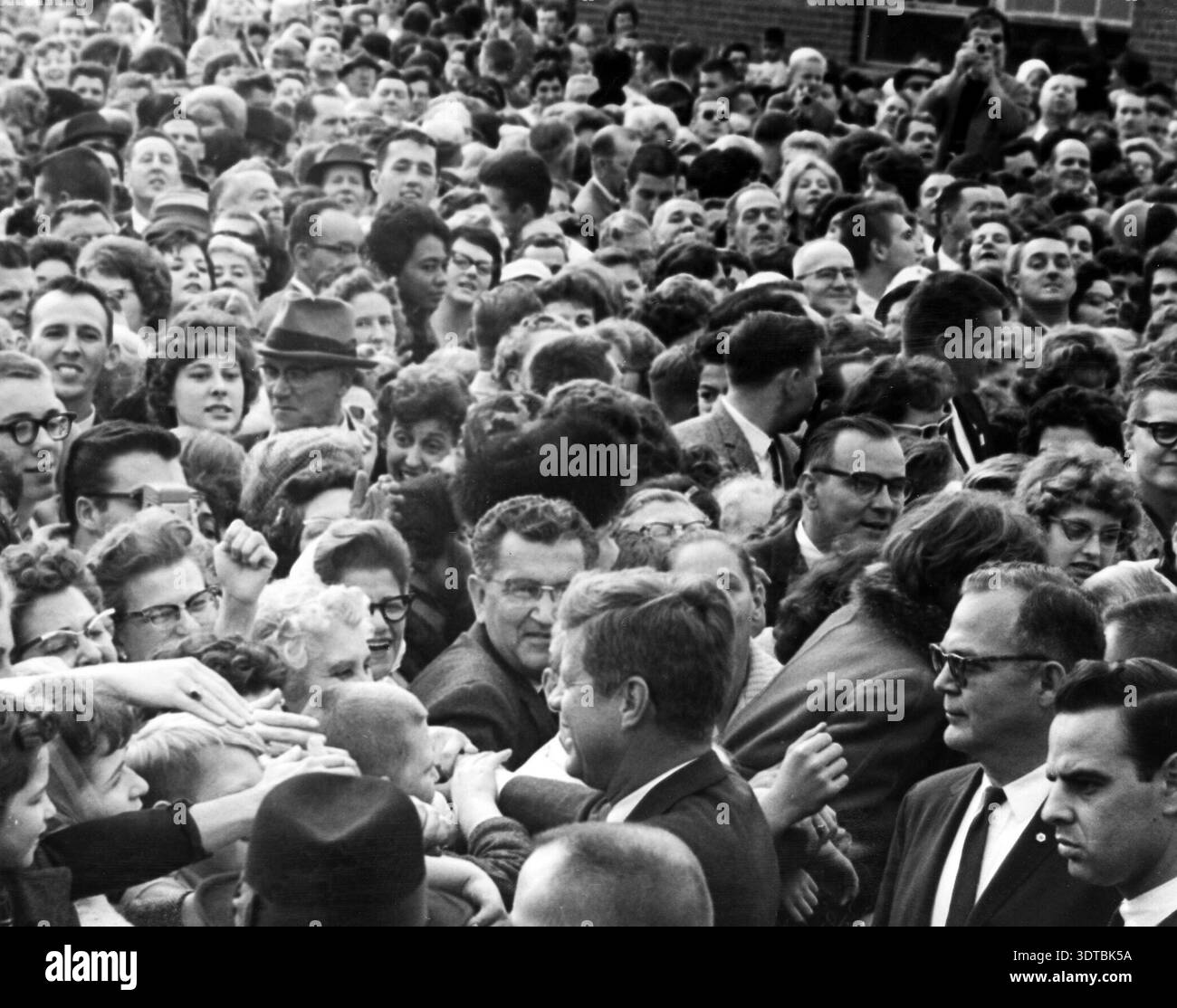 Reaching to the crowd Black and White Stock Photos & Images - Alamy