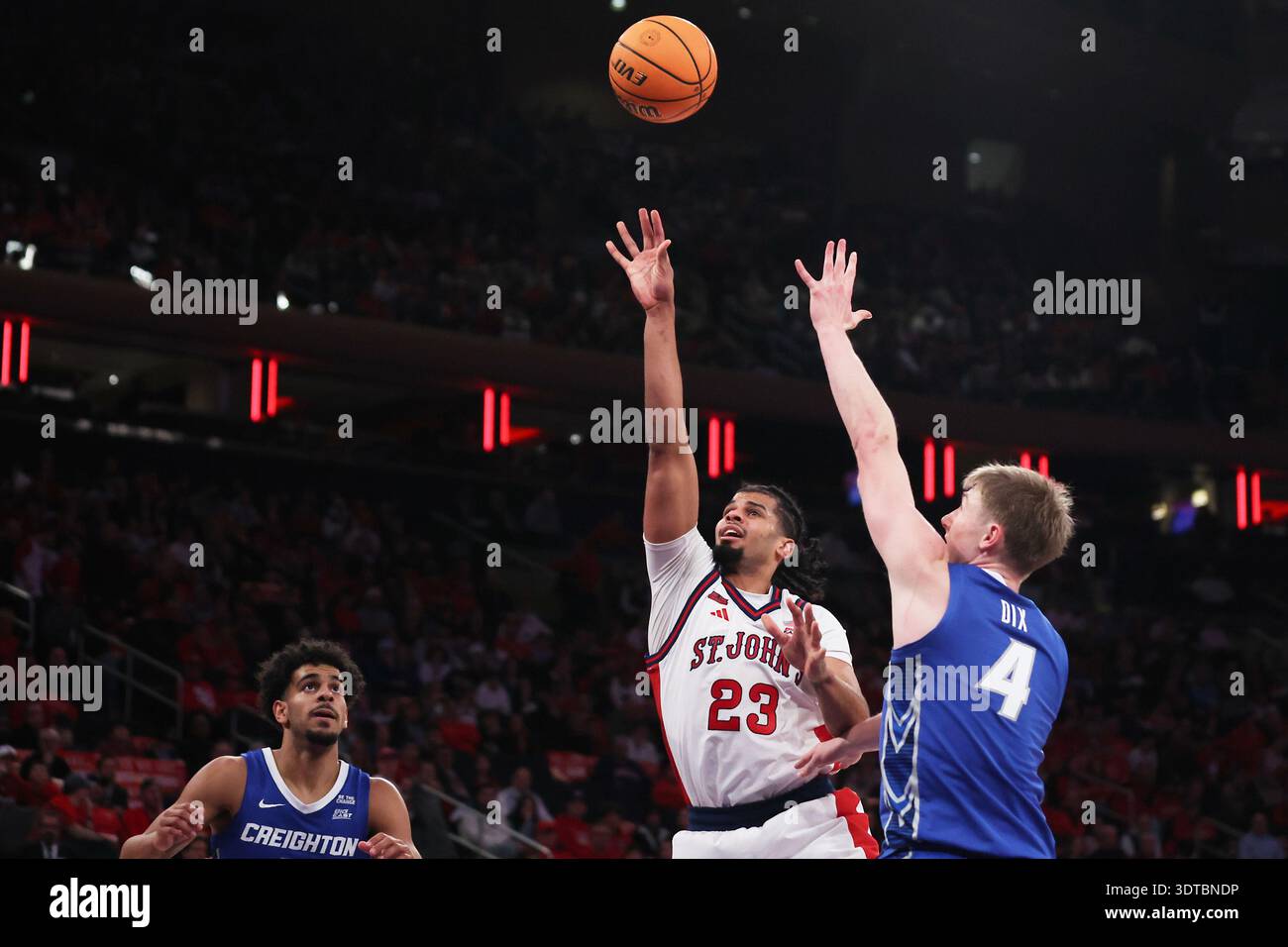 St. John's forward Bryce Hopkins (23) shoots the ball over Creighton ...